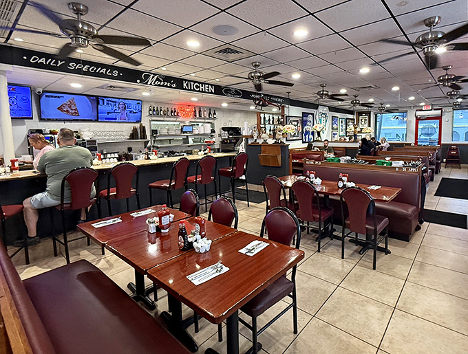 Classic diner perfection with counter seating where regulars exchange friendly nods and servers remember your coffee preference.