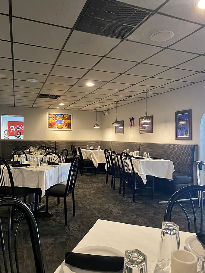 White tablecloths and classic black chairs create that perfect "I'm-somewhere-special-but-don't-need-a-tie" atmosphere that makes Italian dining so comforting.