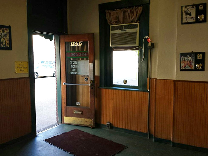 Step inside and time stands still &ndash; wood paneling, simple furnishings, and sports memorabilia tell you this place prioritizes pizza perfection over trendy d&eacute;cor.