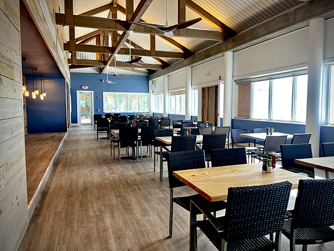 Exposed wooden beams and coastal blues create that "ahh, I've arrived" feeling. Vacation mode: officially activated.