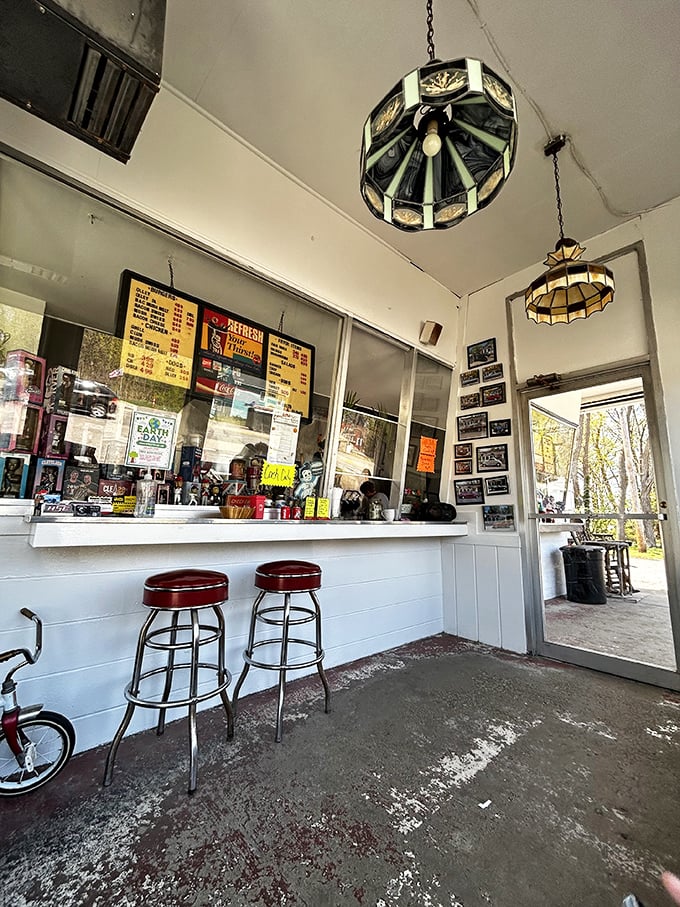 Step inside to vintage hanging lights, red vinyl stools, and just enough room to turn around if you hold your breath. Cozy doesn't begin to cover it.