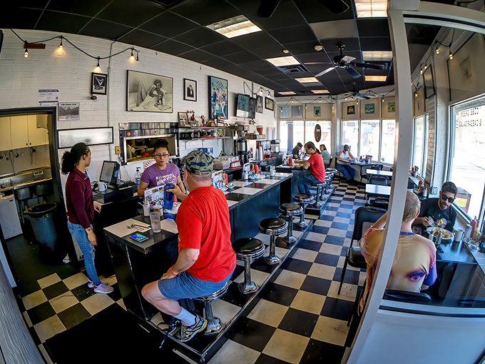 Inside, time stands still. The counter seating offers front-row tickets to the greatest show on earth: breakfast being made with practiced precision.