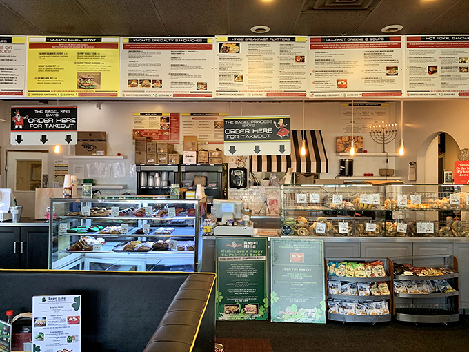 The menu board stretches across the wall, a delicious roadmap to breakfast nirvana that requires strategic planning and an empty stomach.