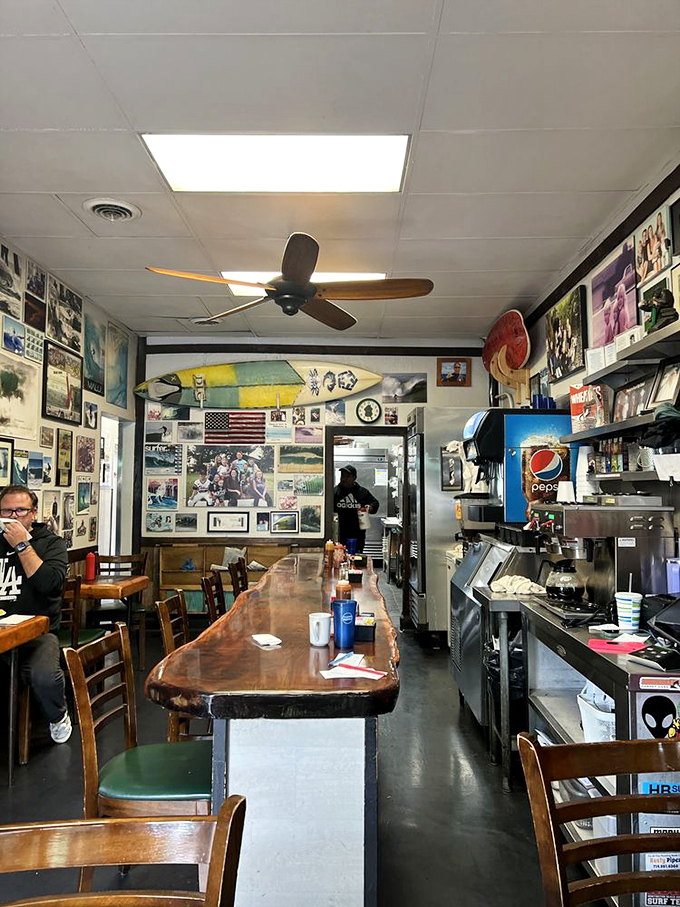 Inside Sugar Shack, surfing memorabilia covers every inch of wall space. The live-edge counter invites solo diners to perch and watch breakfast magic unfold.