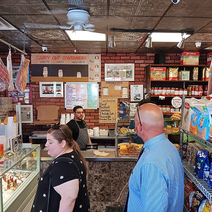 Inside Freddy's, the bustling counter service and handwritten menu boards create that rare "I've just discovered something special" feeling.