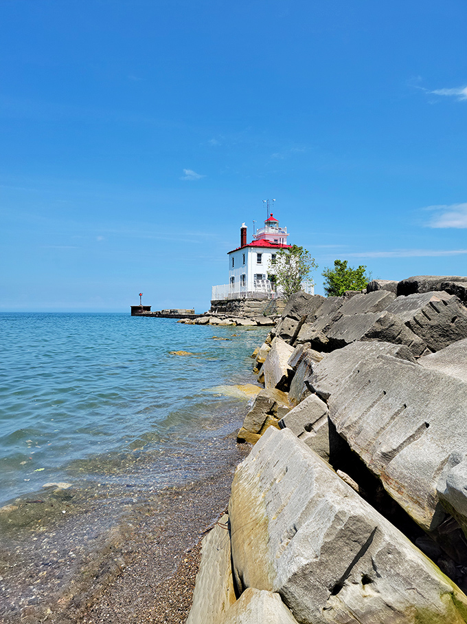 Standing sentinel since 1925, this charming lighthouse could easily be mistaken for a Maine postcard rather than an Ohio landmark.