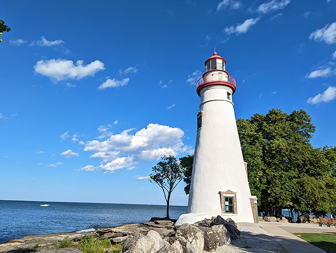 Standing tall since 1822, the Marblehead Lighthouse has witnessed nearly two centuries of Lake Erie's moods while maintaining its picture-perfect composure against impossibly blue Ohio skies.