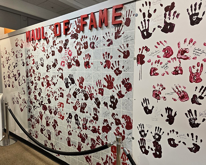The "Maul of Fame" wall showcases bloody handprints from zombie royalty. It's like Hollywood's Walk of Fame after a particularly enthusiastic finger-painting session.
