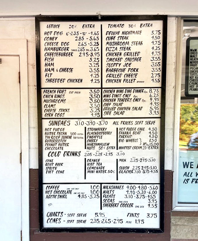 This handwritten menu board is the roadmap to happiness&mdash;where decisions between hot fudge and butterscotch become life's most pressing concerns.