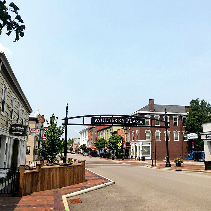 Mulberry Plaza welcomes visitors with its charming archway, a gateway to Lebanon's shopping district where small-town America thrives in technicolor.