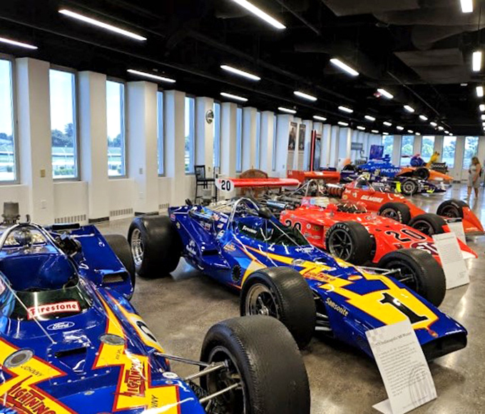 A rainbow of racing royalty awaits inside, where these magnificent machines&mdash;once thundering around the track at 200+ mph&mdash;now rest in dignified retirement.