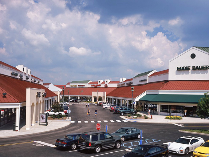 Eddie Bauer stands sentinel at the crossroads of comfort and style, where Hoosiers navigate the village-like layout in pursuit of bargains.