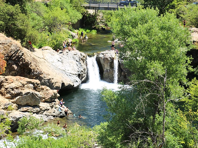 Rainbow Pools offers nature's perfect swimming hole – a refreshing plunge beneath cascading waters where Sierra snowmelt meets summer heat.