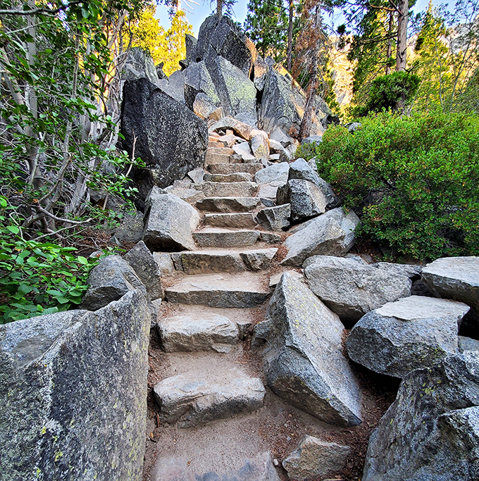 Nature's stairmaster awaits! These hand-carved stone steps leading to Vikingsholm offer both a workout and a journey through time. The Vikings would approve.