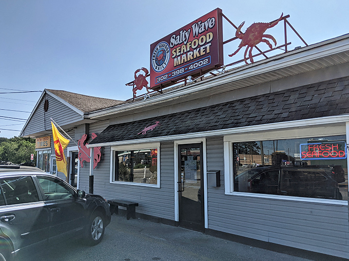 Salty Wave Seafood Market announces its treasures with unmistakable rooftop crabs. Inside awaits the fresh catch that makes coastal living worth every penny.