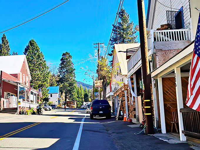 American flags flutter along Sierra City's sun-drenched main drag, where the sky is impossibly blue and time moves at the perfect "I'm-finally-on-vacation" pace.