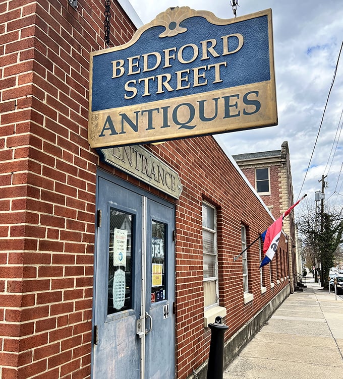 That classic blue sign beckons like a vintage siren song, promising adventures in time travel just beyond those doors.
