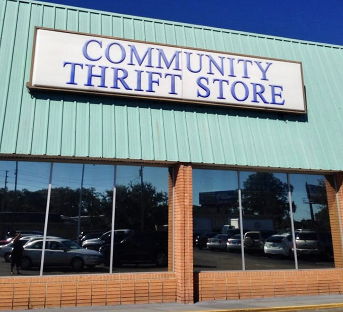 Blue skies and big bargains&mdash;the Community Thrift Store sign promises adventures in secondhand shopping that rival any theme park experience.