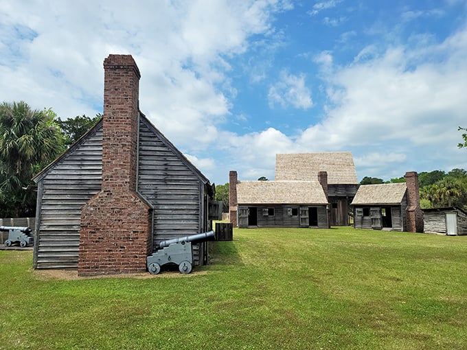 Colonial architecture meets military practicality in this collection of structures. The chimney probably heard more complaints about mosquitoes than enemy sightings.