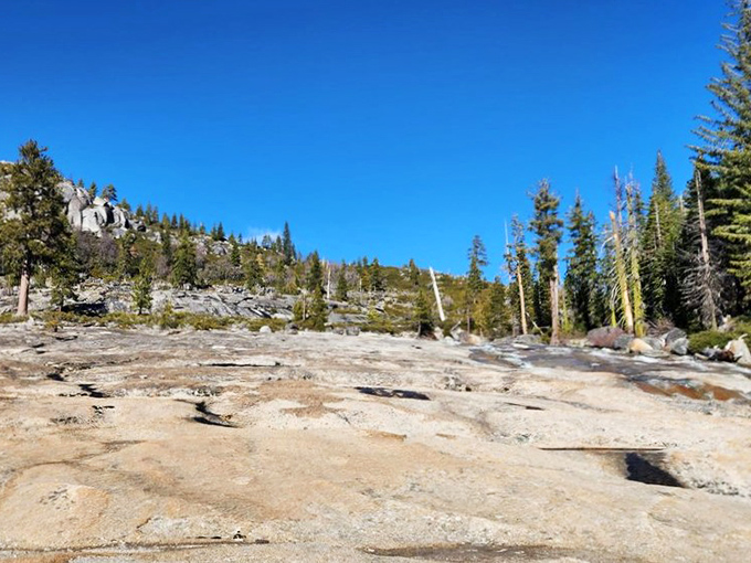 The calm before the plunge. These smooth granite expanses are Mother Nature's version of a water park slide&mdash;minus the overpriced admission and questionable snack bar.