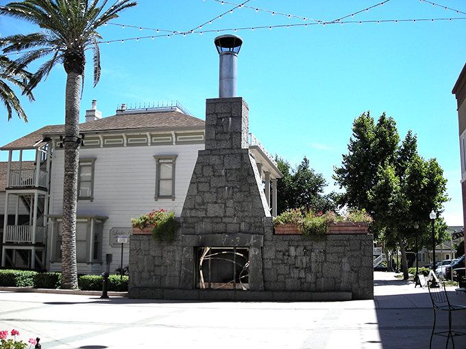 This isn't just a fireplace&mdash;it's the community's hearth, where strangers become neighbors and cold evenings transform into warm memories. 