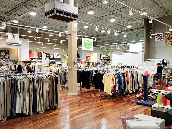 Not your grandmother's thrift store layout. With bright lighting and organized displays, this clothing section rivals department stores minus the sticker shock.