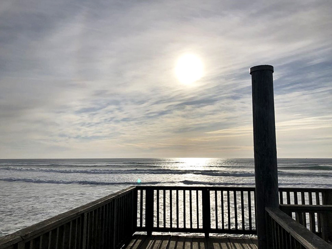 Nature's own infinity pool. The viewing platform at Fort Stevens offers the kind of sunset panorama that makes smartphone cameras weep with inadequacy.