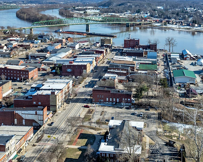 A bird's-eye view reveals Marietta's clever positioning between two rivers, like nature's own moat protecting this treasure from the modern rush.