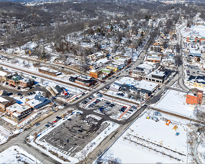 Winter blankets Parkville in a postcard-worthy aerial view that reveals the town's perfect balance of cozy neighborhoods and thoughtful urban planning.