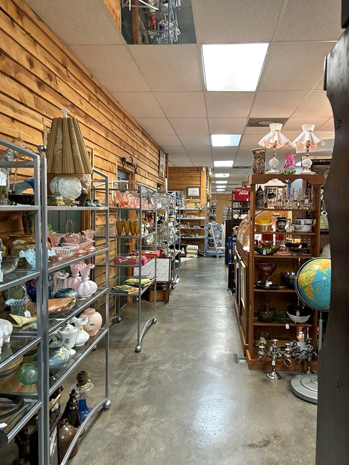 Wooden-walled corridors stretch toward infinity, each shelf a carefully curated chapter in someone else's story waiting for you to continue.