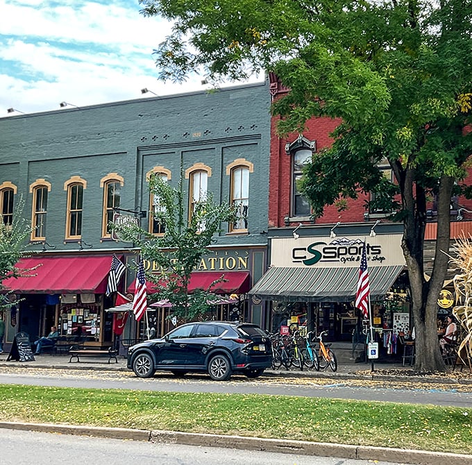 Historic storefronts with colorful awnings invite exploration along Wellsboro's downtown, where shopping local isn't trendy&mdash;it's tradition dating back generations.