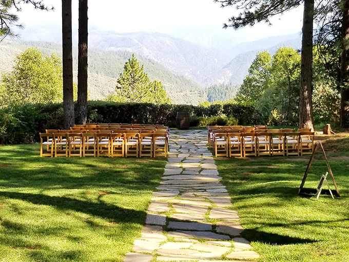 Wedding dreams come true with this ceremony setup. Nature provides the cathedral ceiling while the Sierra Nevada mountains deliver a backdrop no decorator could match.