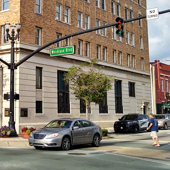 Woodland Boulevard, DeLand's main artery, where brick buildings whisper stories of yesteryear while housing today's thriving businesses.