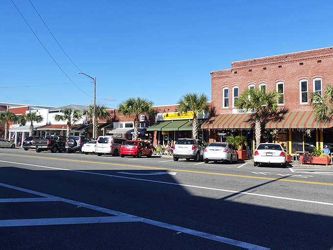 Historic brick facades stand sentinel over Apalachicola's main street, where parking spots are treasured almost as much as the town's famous oysters.