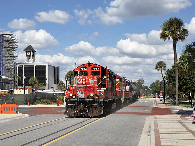 The historic red train chugging through downtown Ocala feels like a time machine on wheels, connecting the city's past with its vibrant present.