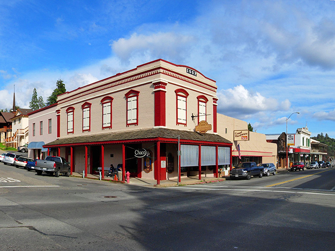 This corner building has witnessed more California history than most textbooks. The red trim pops against the blue sky like a Gold Rush-era Instagram filter.