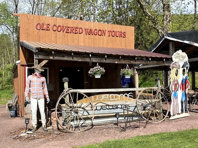 The rustic welcome center sets the perfect old-timey mood. Those wagon wheels have seen more authentic adventures than your GPS ever will.