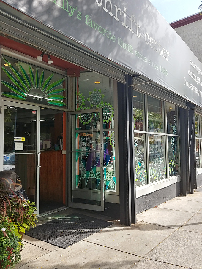 Colorful stained-glass-inspired window decorations welcome shoppers into a world where one person's castoffs become another's prized possessions.