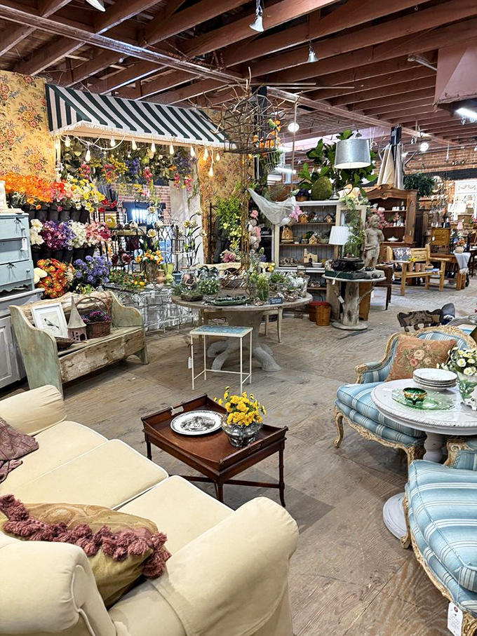 Staged vignettes create little worlds within worlds&mdash;this floral-meets-furniture arrangement invites you to imagine hosting tea parties in your own garden oasis.