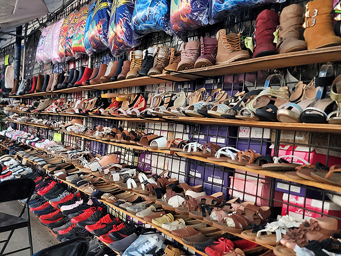 Footwear fantasyland! From work boots to sandals, this wall of shoes could outfit a small army—or just one very indecisive shopper with big dreams.