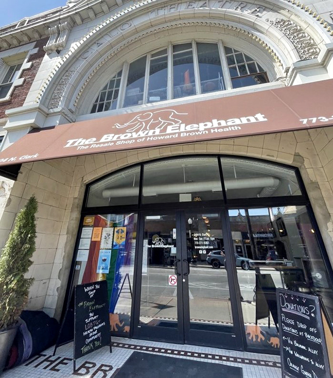 Look up! The architectural details above The Brown Elephant entrance hint at the building's glamorous past life as a Chicago theater.