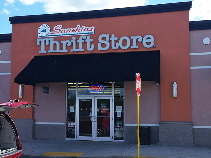 "Your 1st Class 2nd hand store" isn't just a slogan&mdash;it's a promise. The neon "OPEN" sign might as well say "Opportunity knocks."