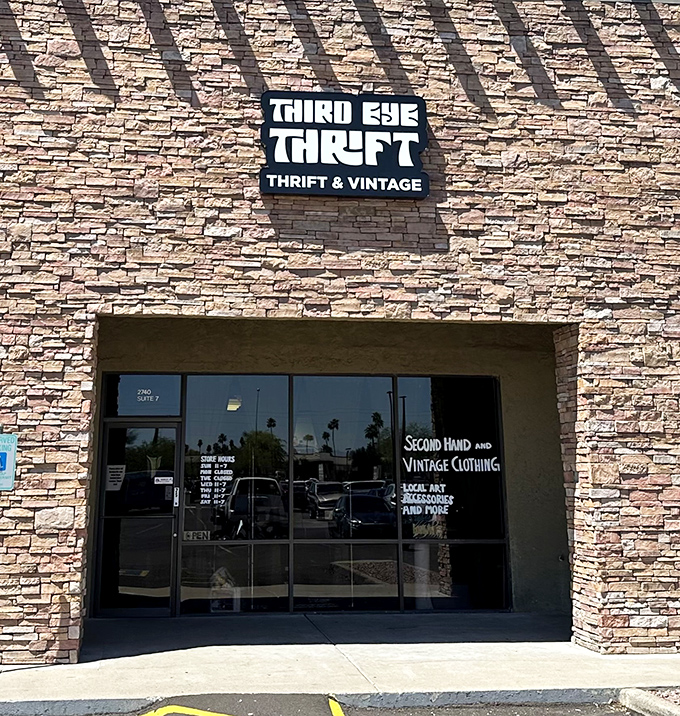 The stone facade might be unassuming, but that retro-futuristic logo promises a journey through time rather than just another shopping trip.