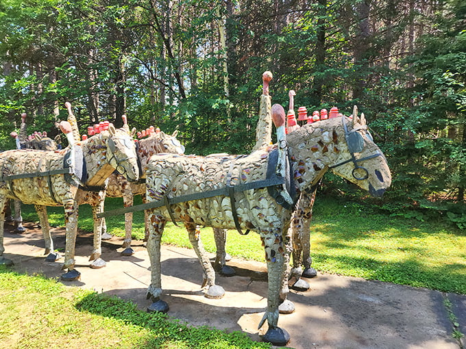 These concrete horses aren't horsing around—their glass bottle embellishments catch the sunlight like disco balls at an outdoor party that never ends.
