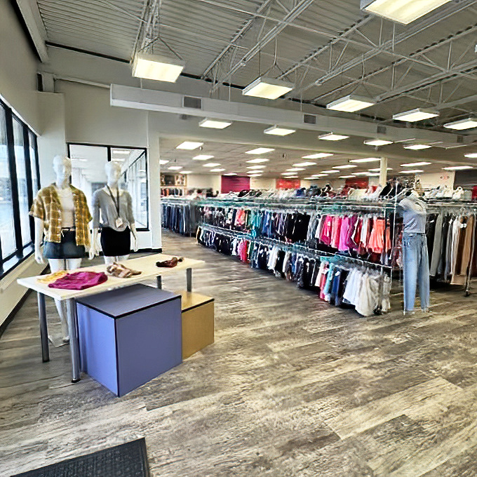 Inside, the spacious layout defies the "rummage sale" stereotype with organized displays and mannequins showcasing outfit possibilities that won't break the bank.