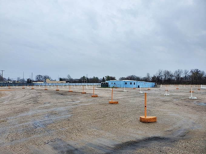 The off-season reveals the bones of this beloved institution. Even empty, there's something poetic about a drive-in waiting for summer's return.