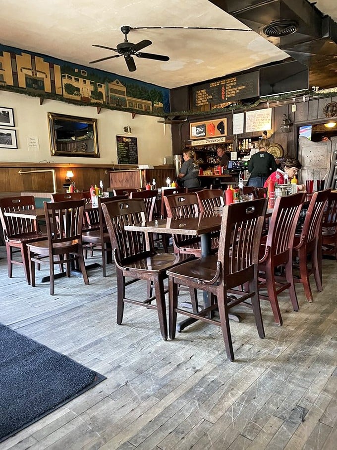 Wooden chairs that have supported generations of diners tell silent stories while ceiling fans lazily spin above, preserving the timeless charm that makes Zip's feel like coming home.