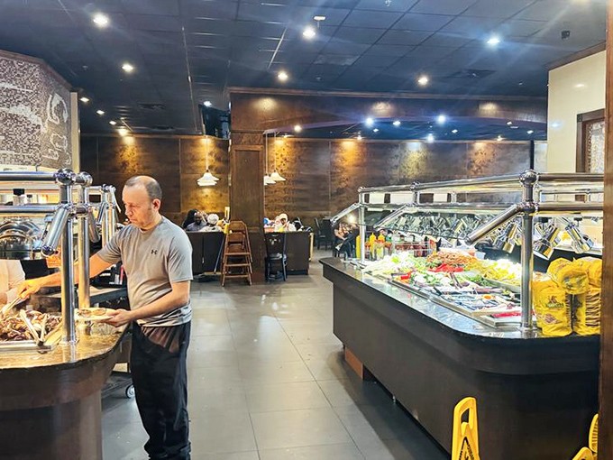 Where buffet dreams come true &ndash; spotless serving stations await hungry patrons while staff ensures everything remains fresh and properly stocked.