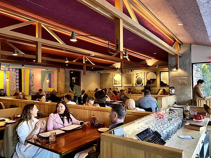 Inside, wooden beams and warm lighting create the perfect backdrop for carnivorous adventures. Like a cozy cabin, but with better food and fewer bears.