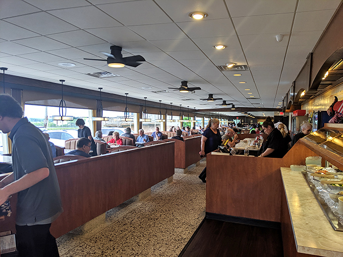 Inside, the classic diner bustle creates that perfect symphony of clinking plates and friendly chatter &ndash; the soundtrack to comfort food paradise.